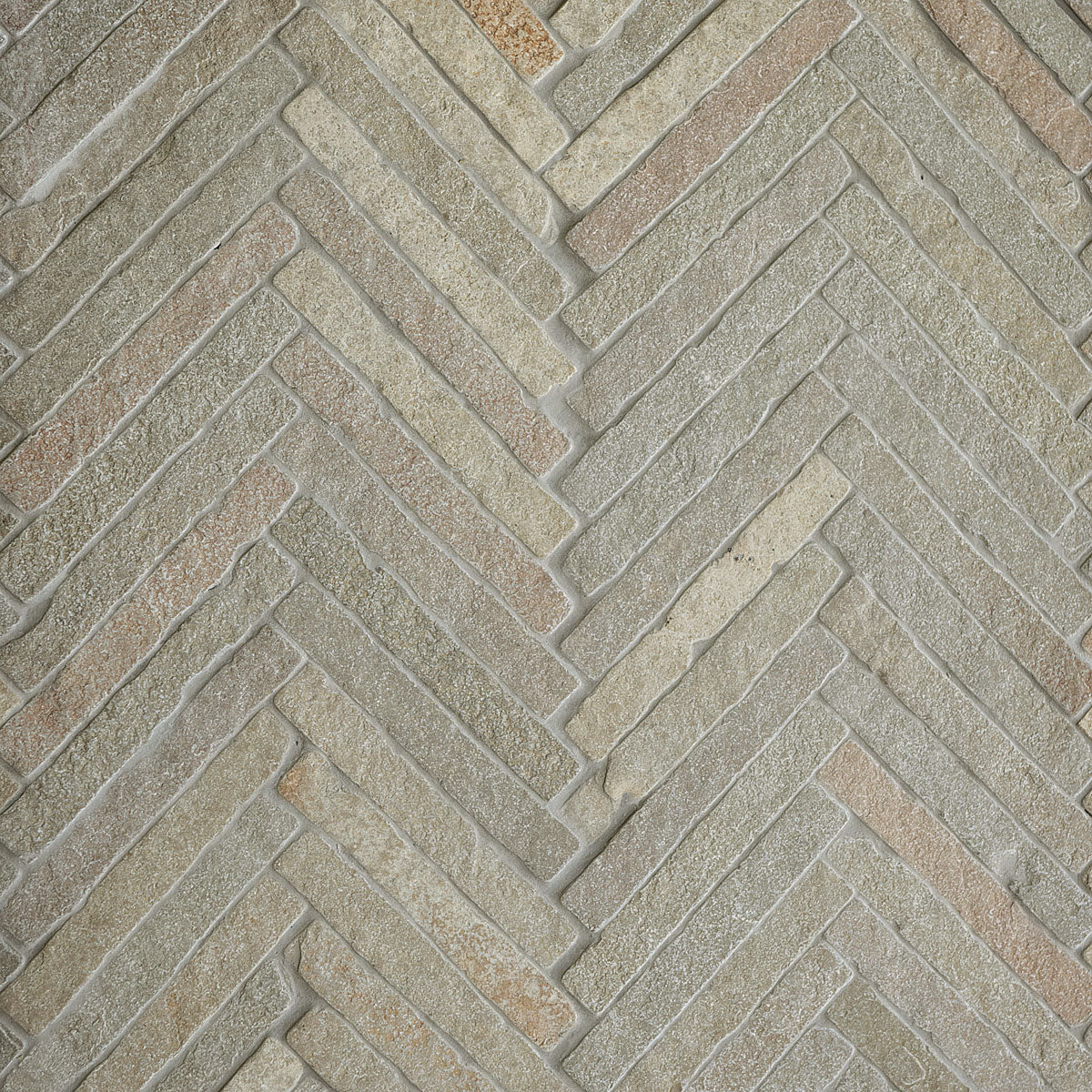 limestone tiles herringbone